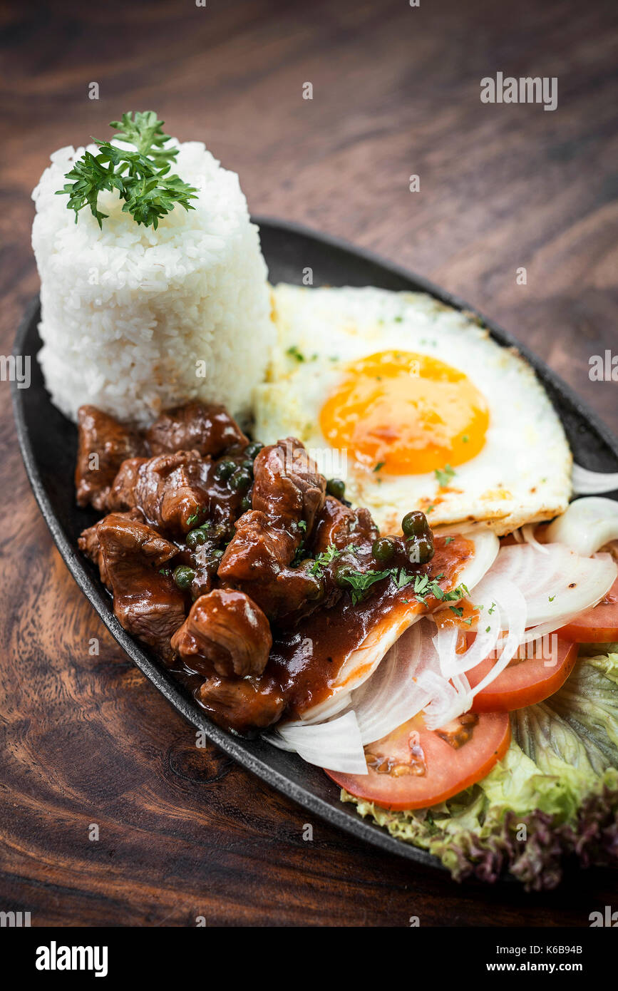 cambodian traditional khmer beef lok lak meal on wooden table Stock ...