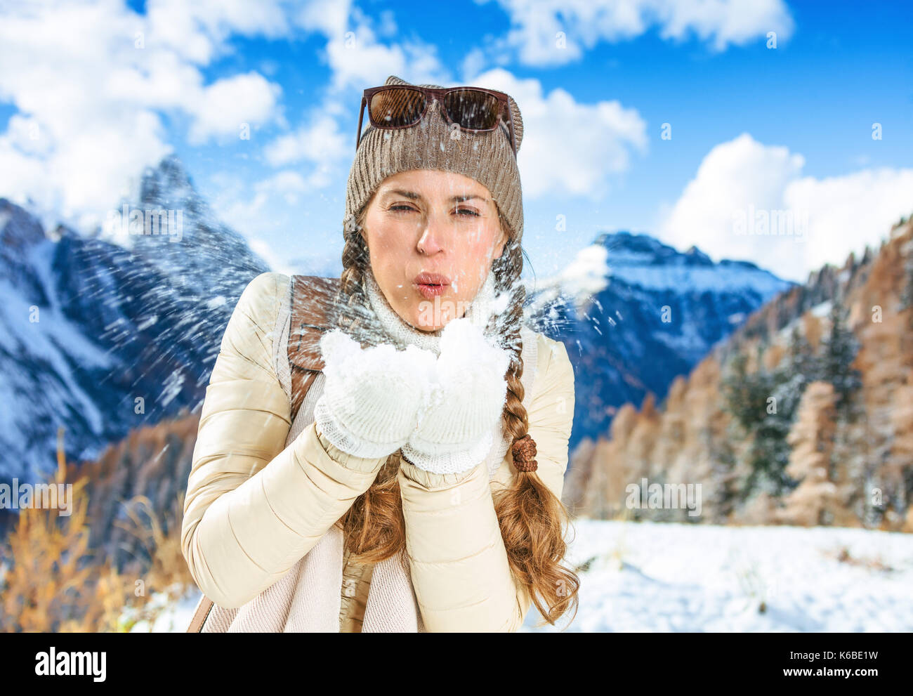 Winter on higher level of fun. smiling modern traveller woman in the ...