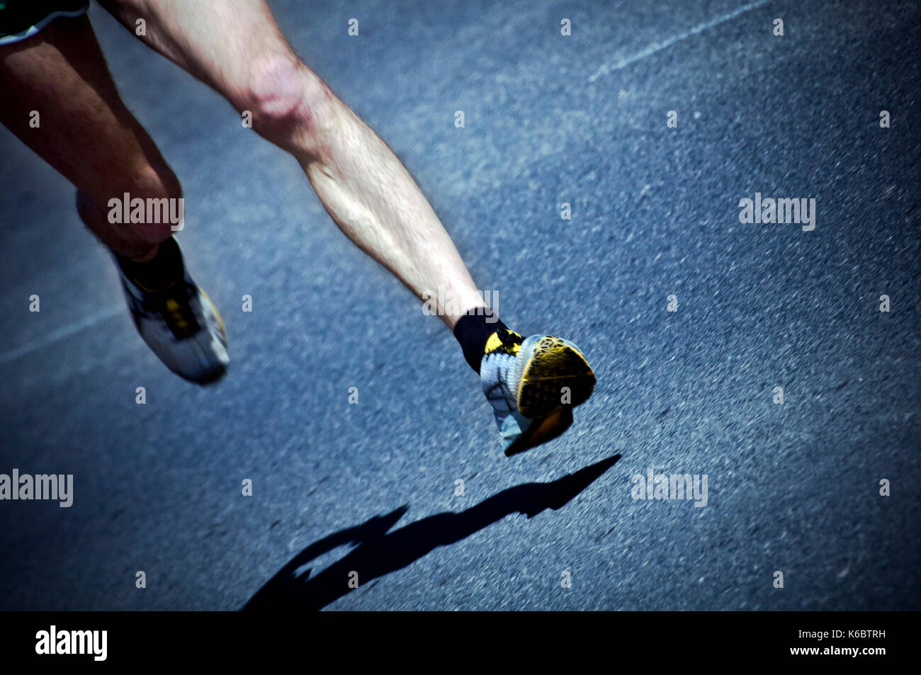 legs of a marathon runner Stock Photo - Alamy