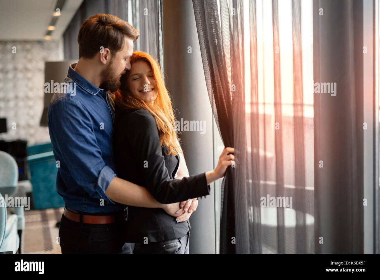 Beautiful romantic couple hugging Stock Photo - Alamy