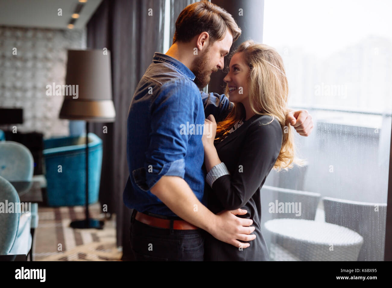 Happy couple hugging and sharing emotions Stock Photo - Alamy