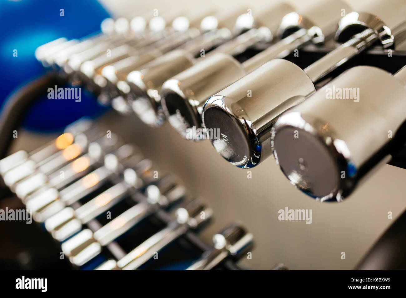 Weights in a gym Stock Photo - Alamy