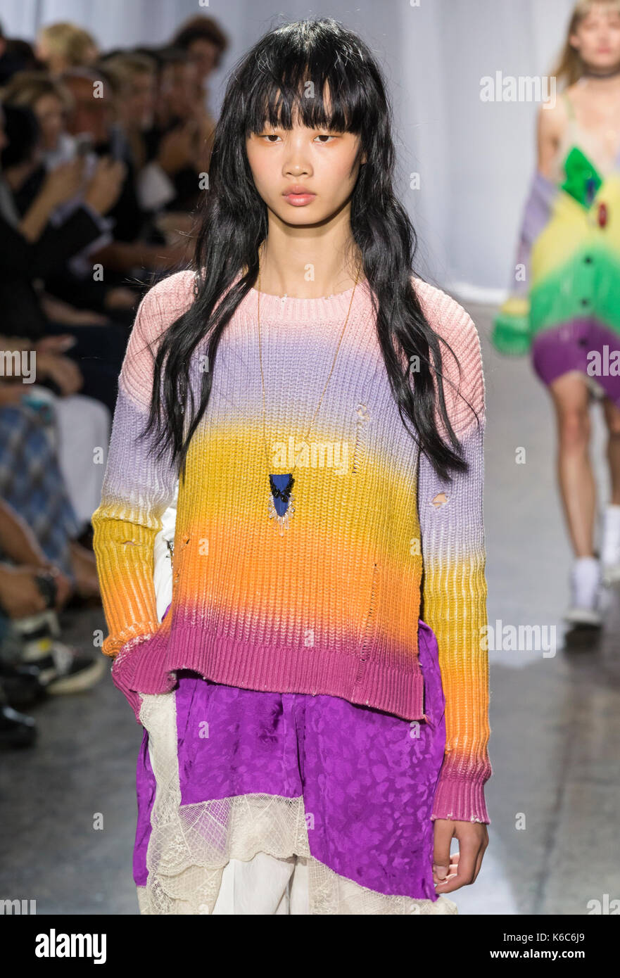 Huan Zhou on the catwalk Stock Photo - Alamy