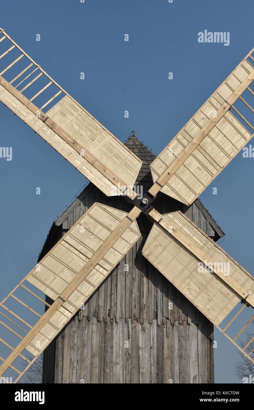 Wooden windmill. Monument. Antique mill powered by the wind Stock Photo ...