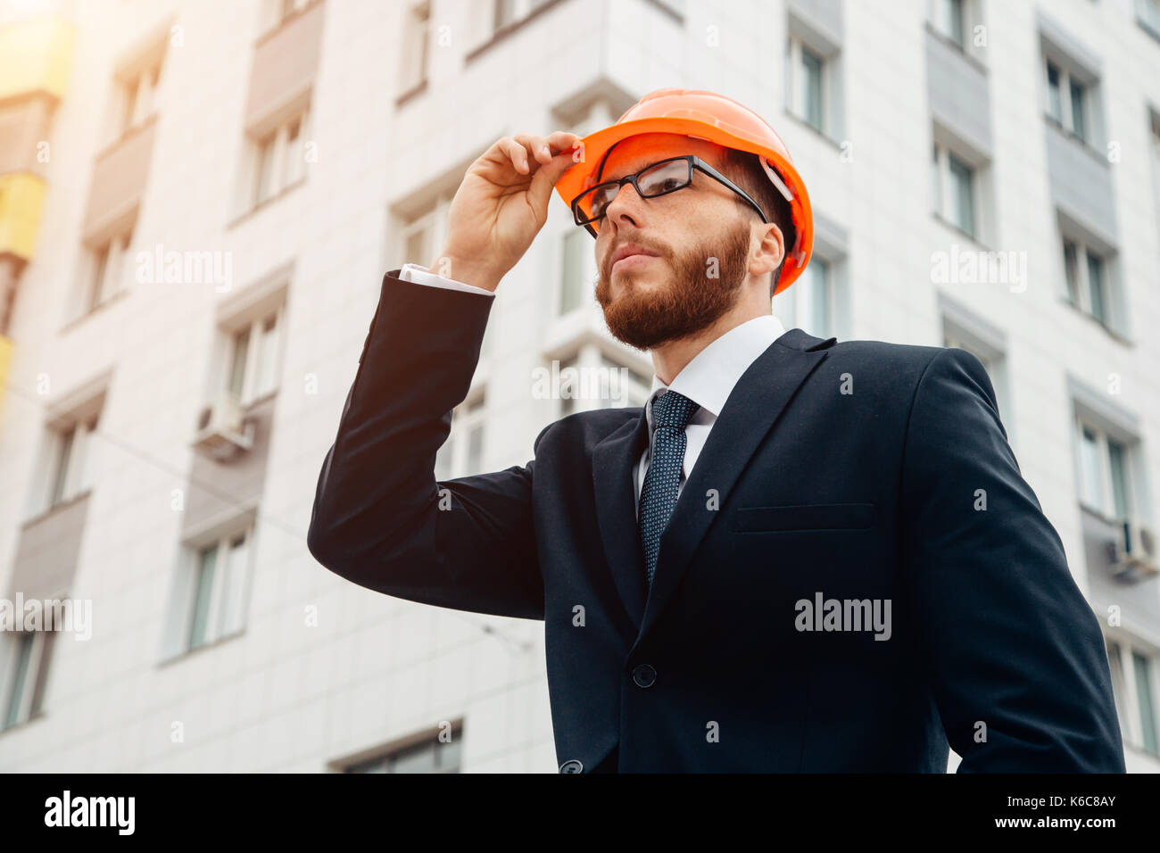 Engineer in a helmet, builder in a helmet, builder with glasses at ...