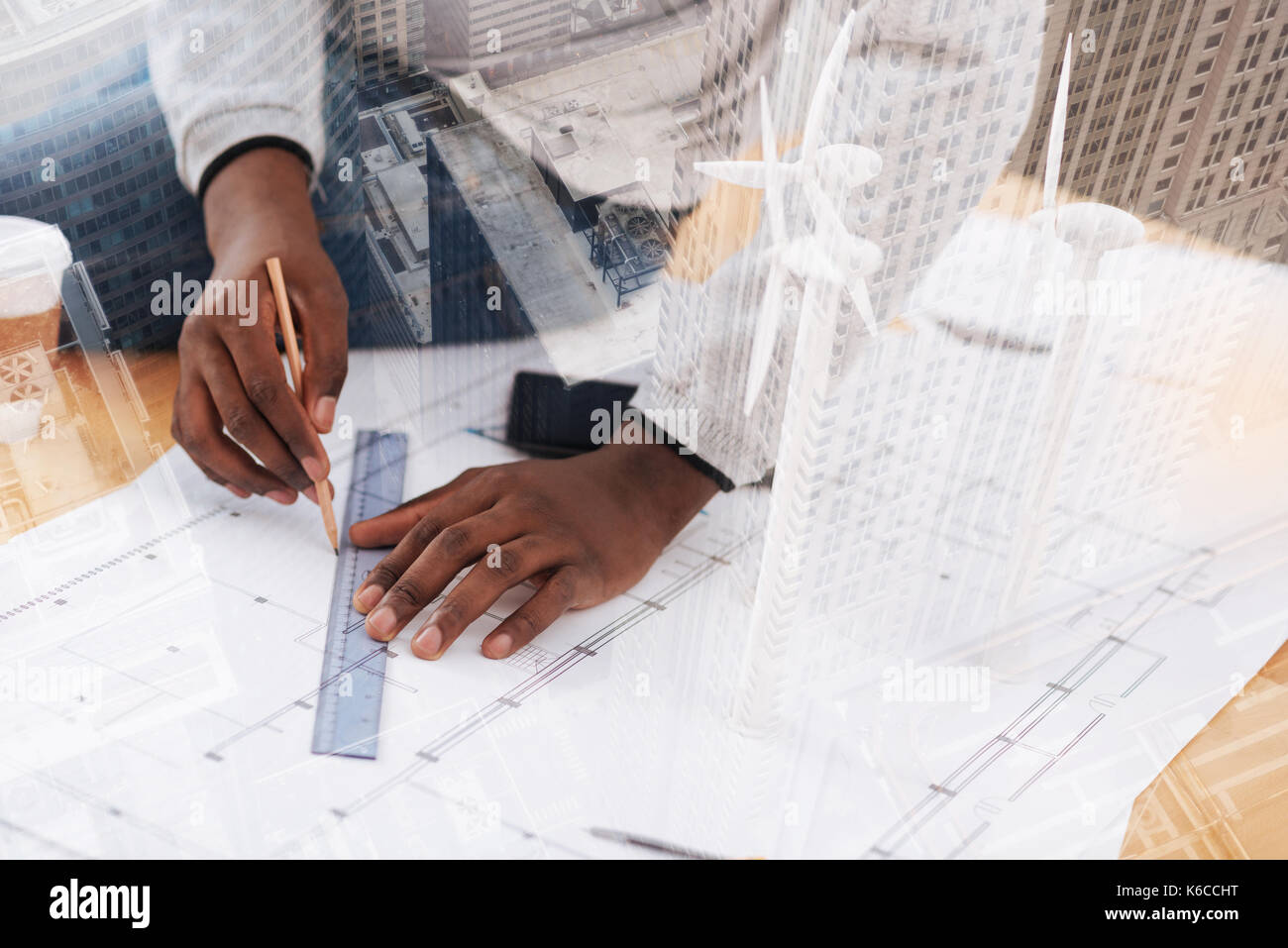 Close up of successful engineer making measurements Stock Photo - Alamy