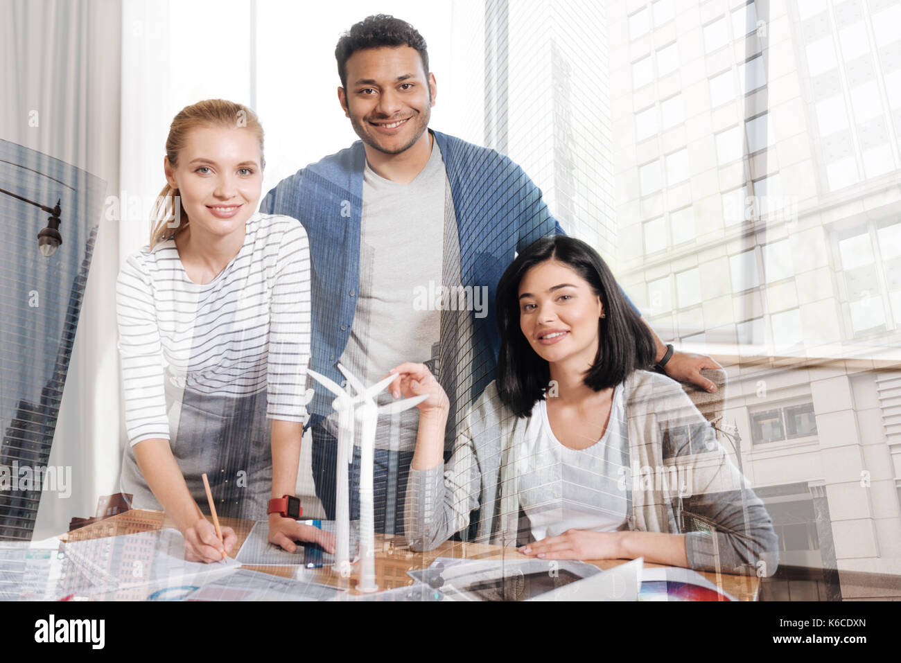 Successful team of young ambitious workers Stock Photo - Alamy