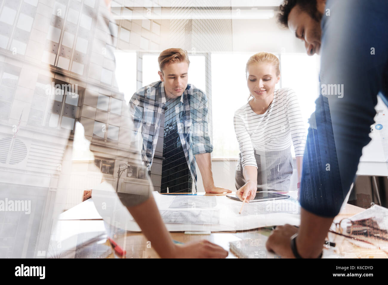 Hard working colleagues busy in the office Stock Photo - Alamy