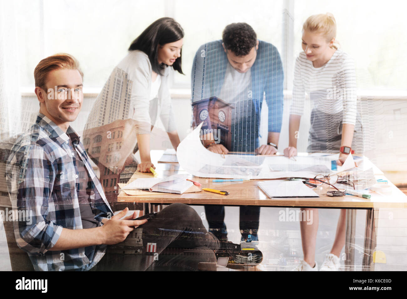 Attentive team standing table hi-res stock photography and images - Alamy