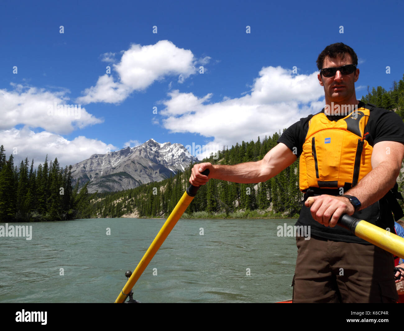 Float raft guide, Bow River, Banff, Alberta, Canada Stock Photo - Alamy