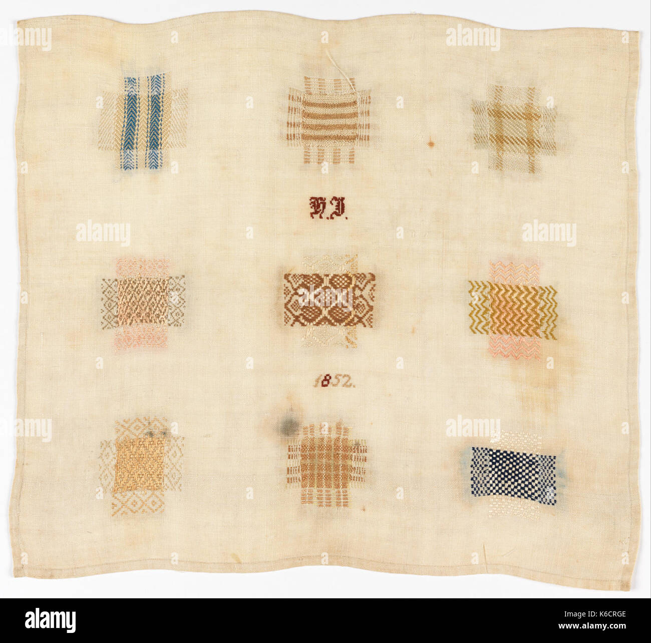 A darning sampler, part of an artistic tradition, showcases decorative ...