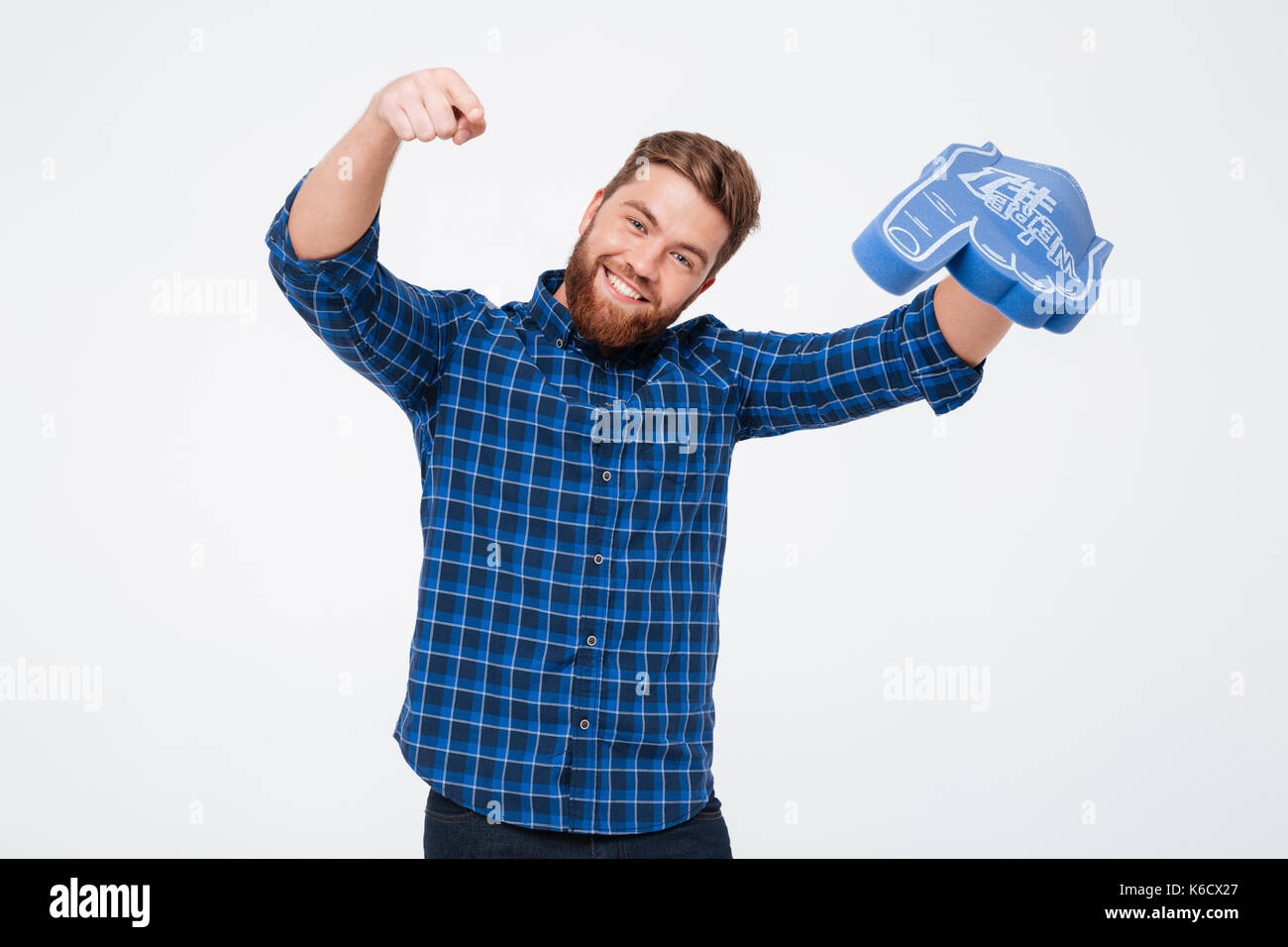 Happy bearded casual man with fan finger pointing at camera isolated ...