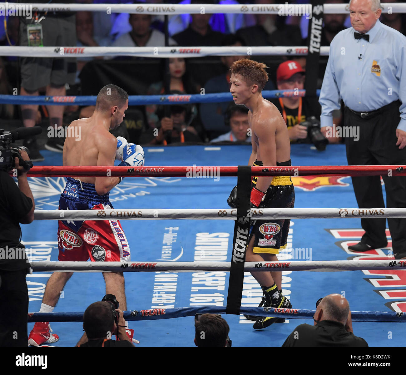 (L-R) Antonio Nieves (USA), Naoya Inoue (JPN), Lou Moret (Referee ...