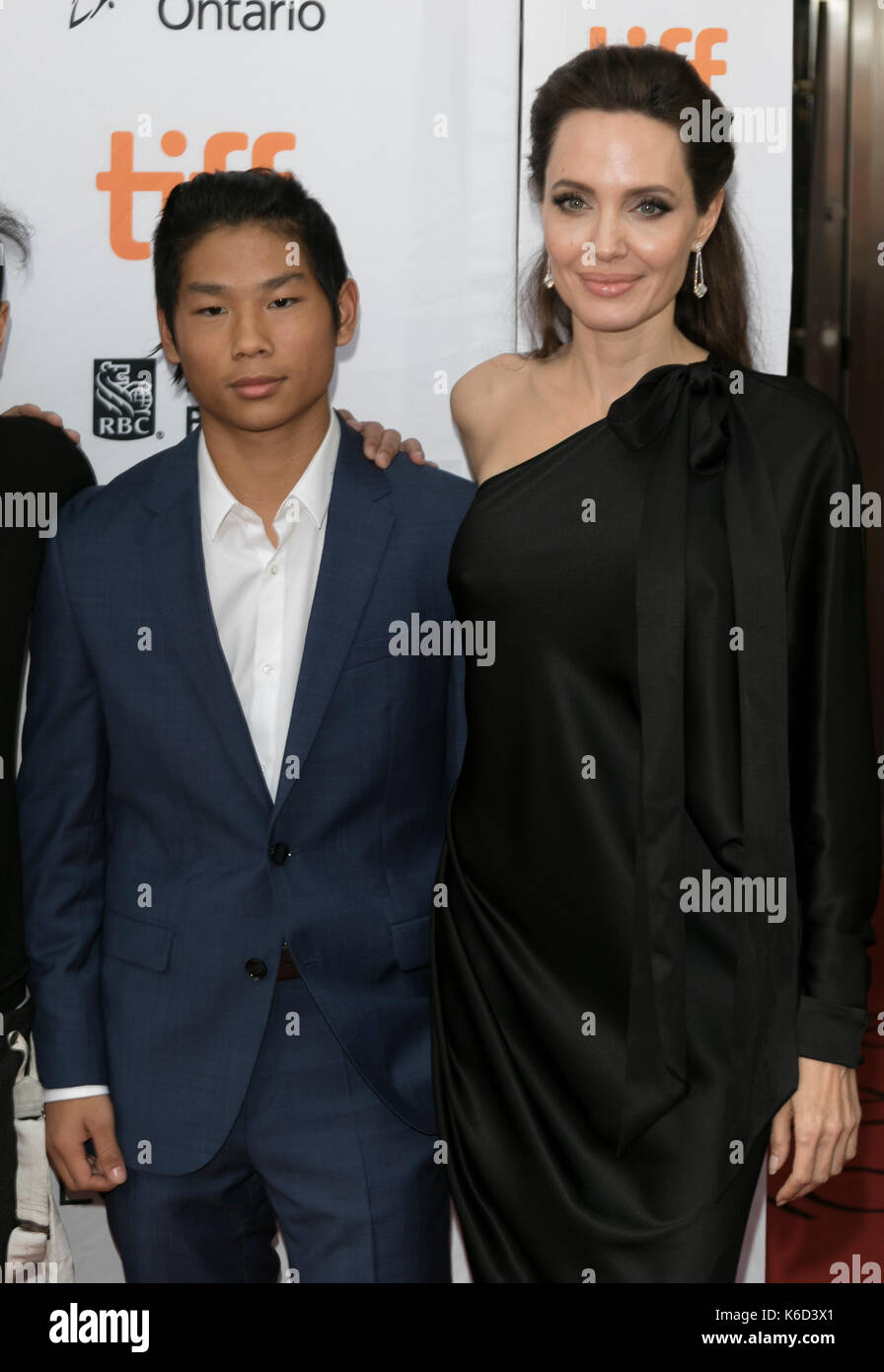 Toronto, Canada. 11th Sep, 2017. Pax Thien Jolie-Pitt (l) and Angelina ...