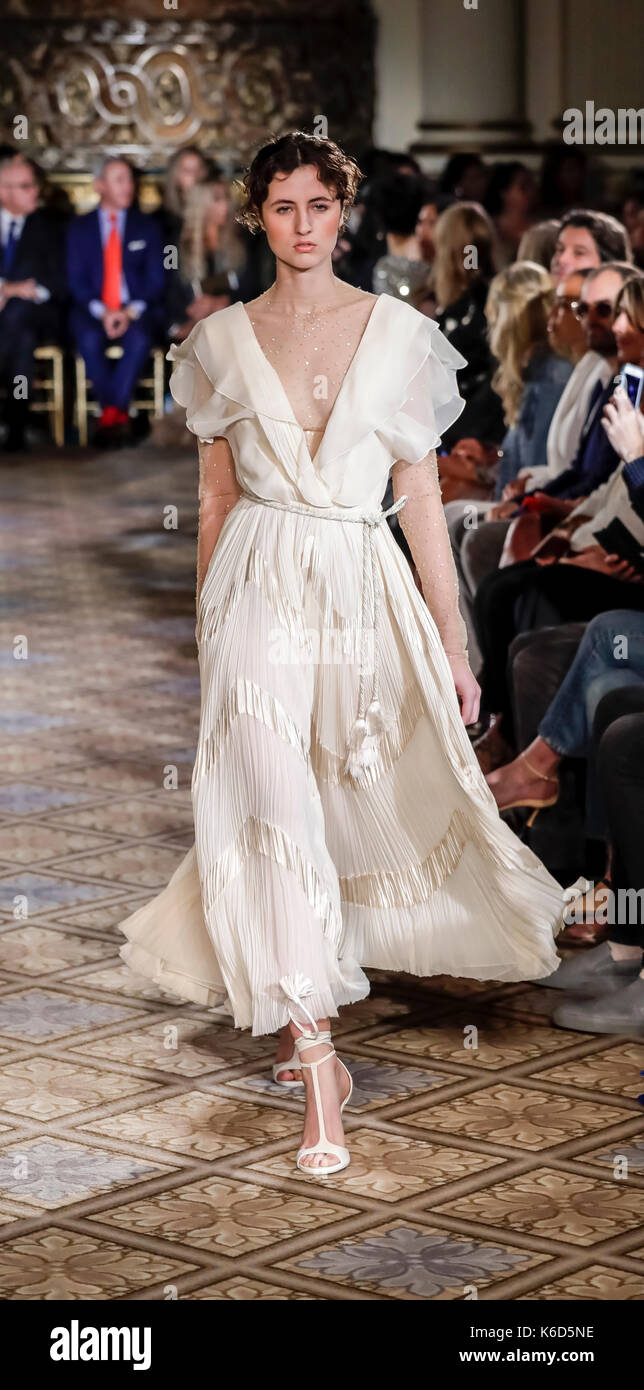 A model walks runway for the Dennis Basso Spring/Summer 2018 runway ...