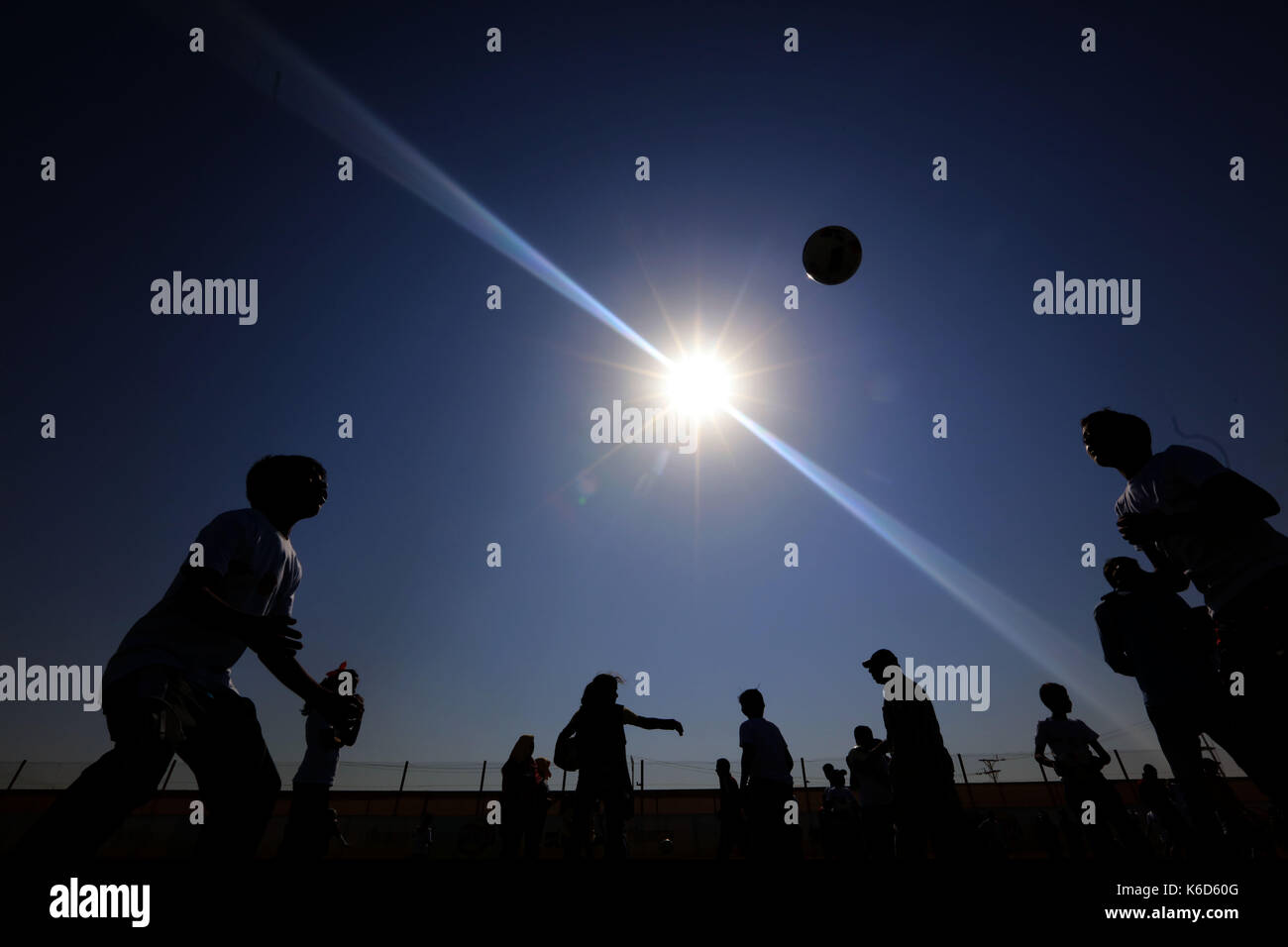 Refugee camp syria children play hi-res stock photography and images ...