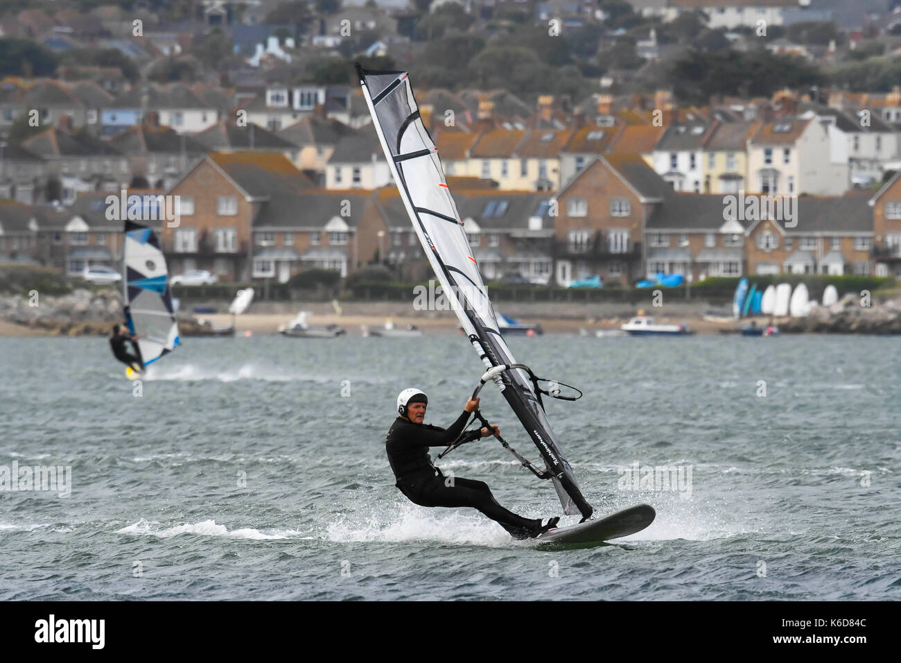 Portland, Dorset, UK. 12th Sep, 2017. UK Weather. Windsurfers take ...