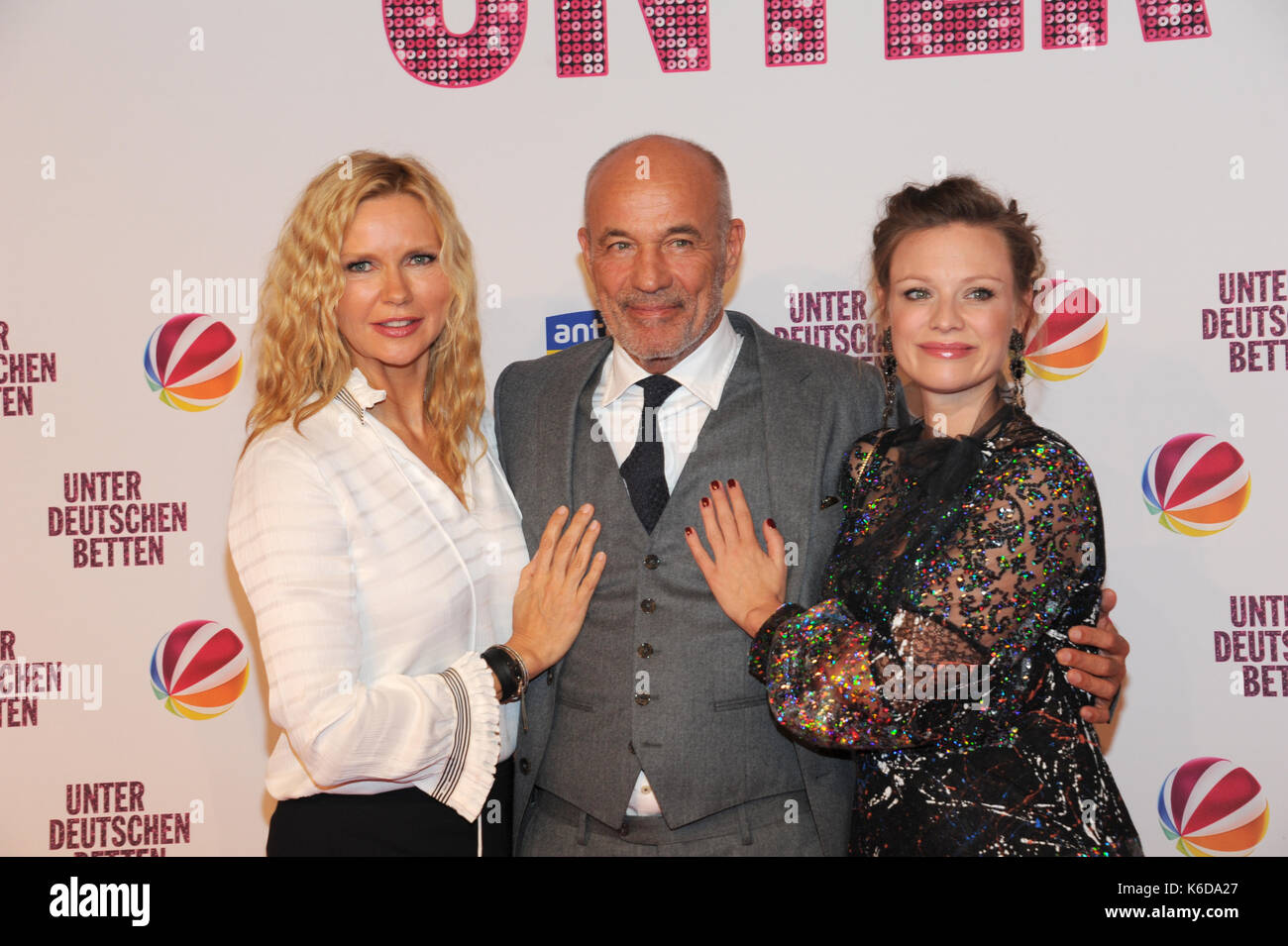 Munich, Germany. 12th Sep, 2017. Actors Heiner Lauterbach (c), Magdalena Boczarska (r) and ...