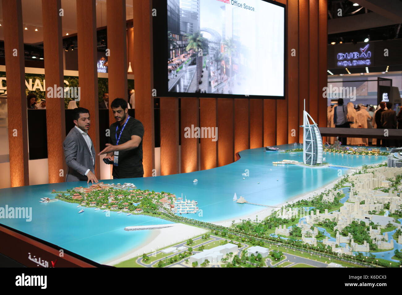 Dubai. 12th Sep, 2017. A seller introduces a project to an investor at ...