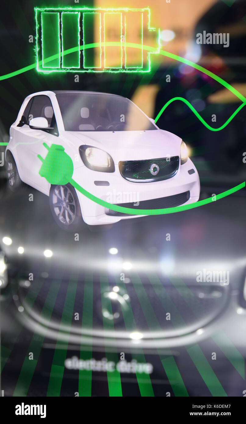 An animation can be seen on a display in an electric car at the stand ...