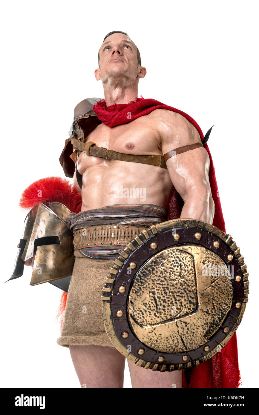 Ancient warrior or Gladiator posing over a white background Stock Photo ...