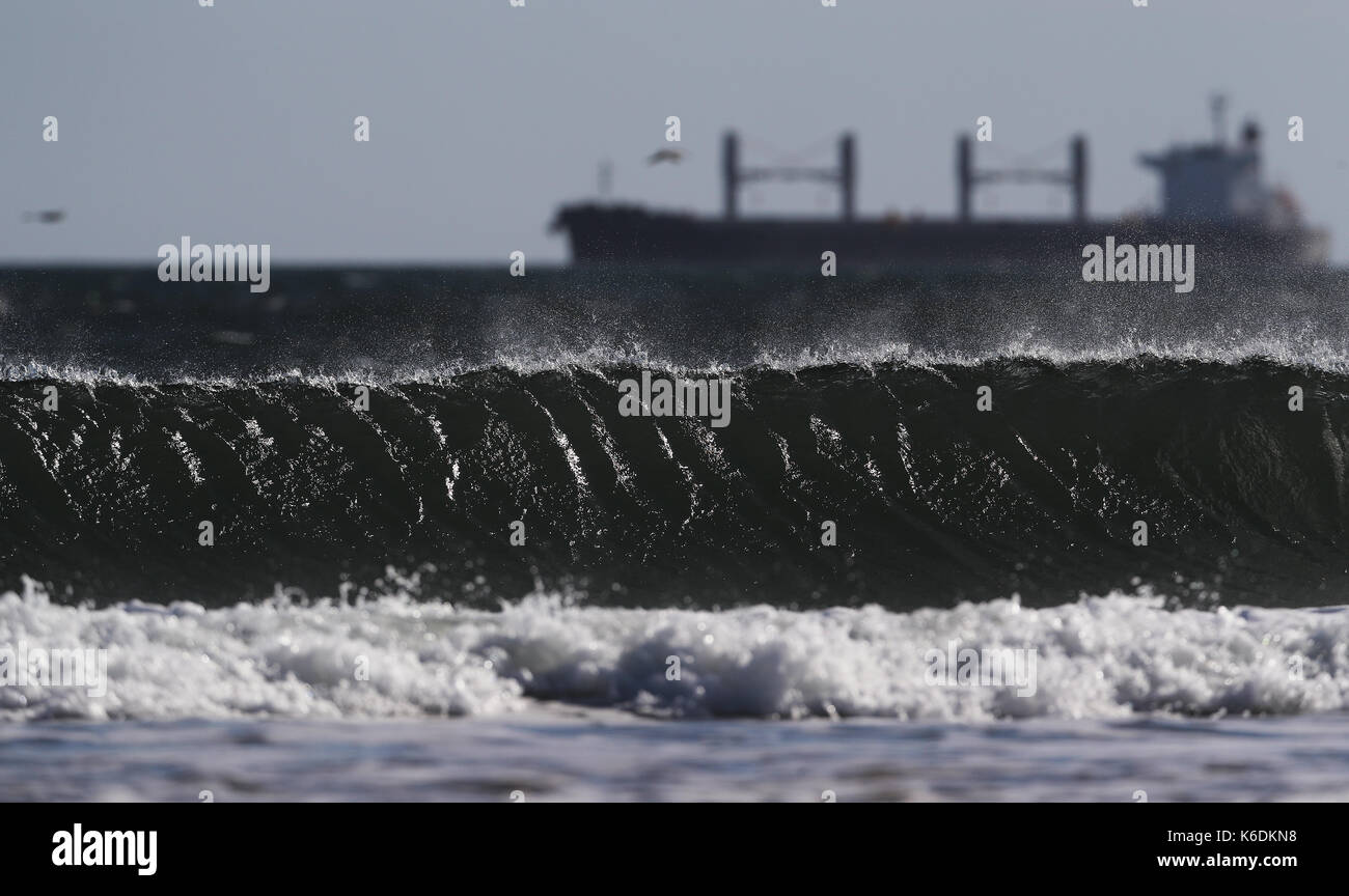 Large waves crash on tynemouth beach in north tyneside hi-res stock ...