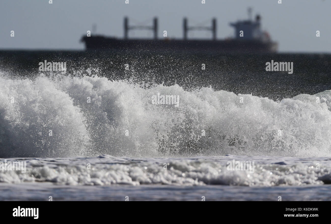 Large waves crash on tynemouth beach in north tyneside hi-res stock ...