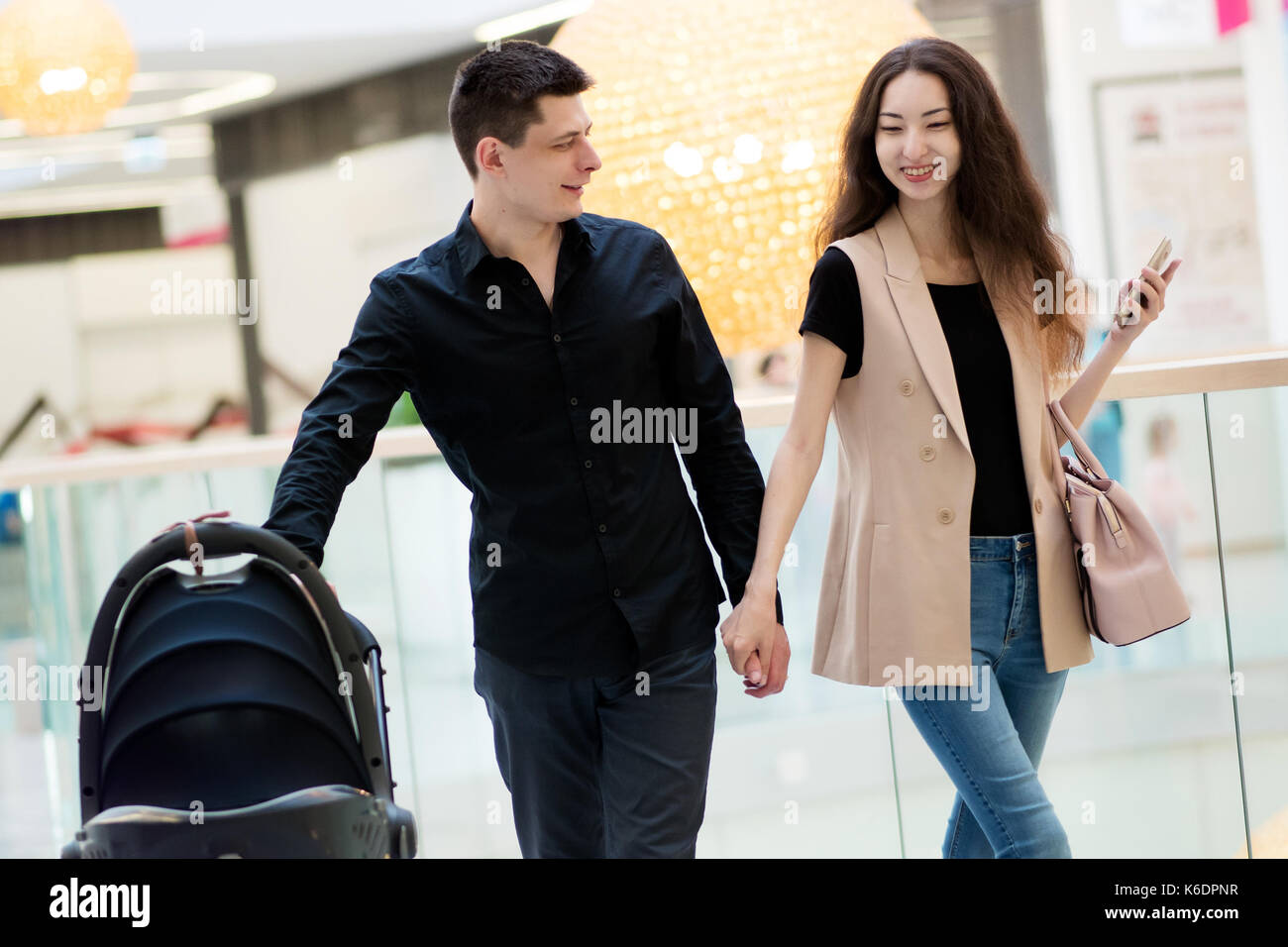 Husband wife shopping for baby hi-res stock photography and images - Alamy