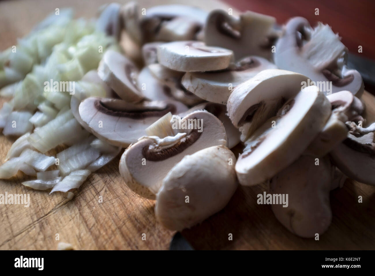 Mushrooms cut for cooking Stock Photo - Alamy