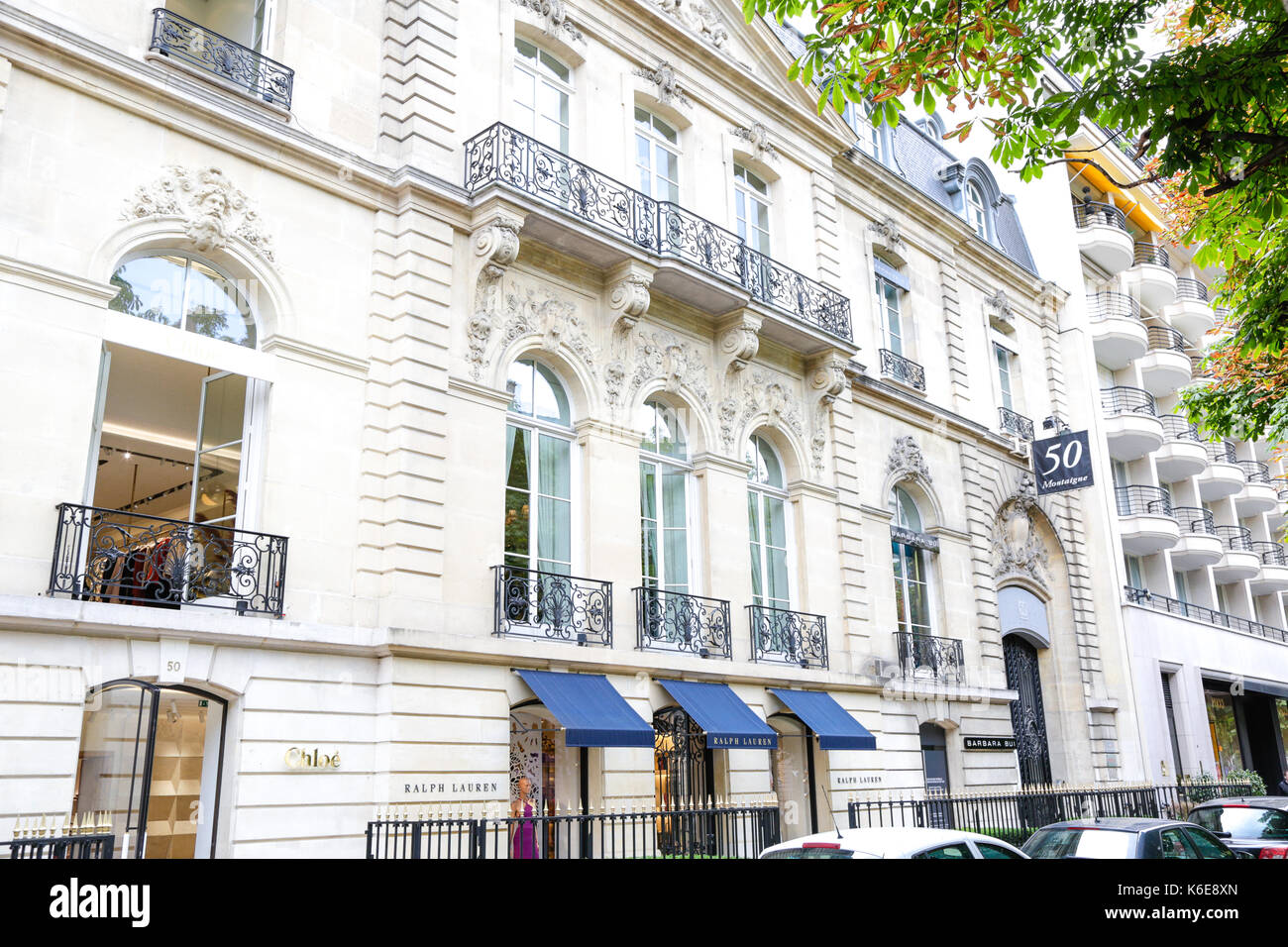 Paris, France: luxury branded shops in typical haussmann palaces and ...