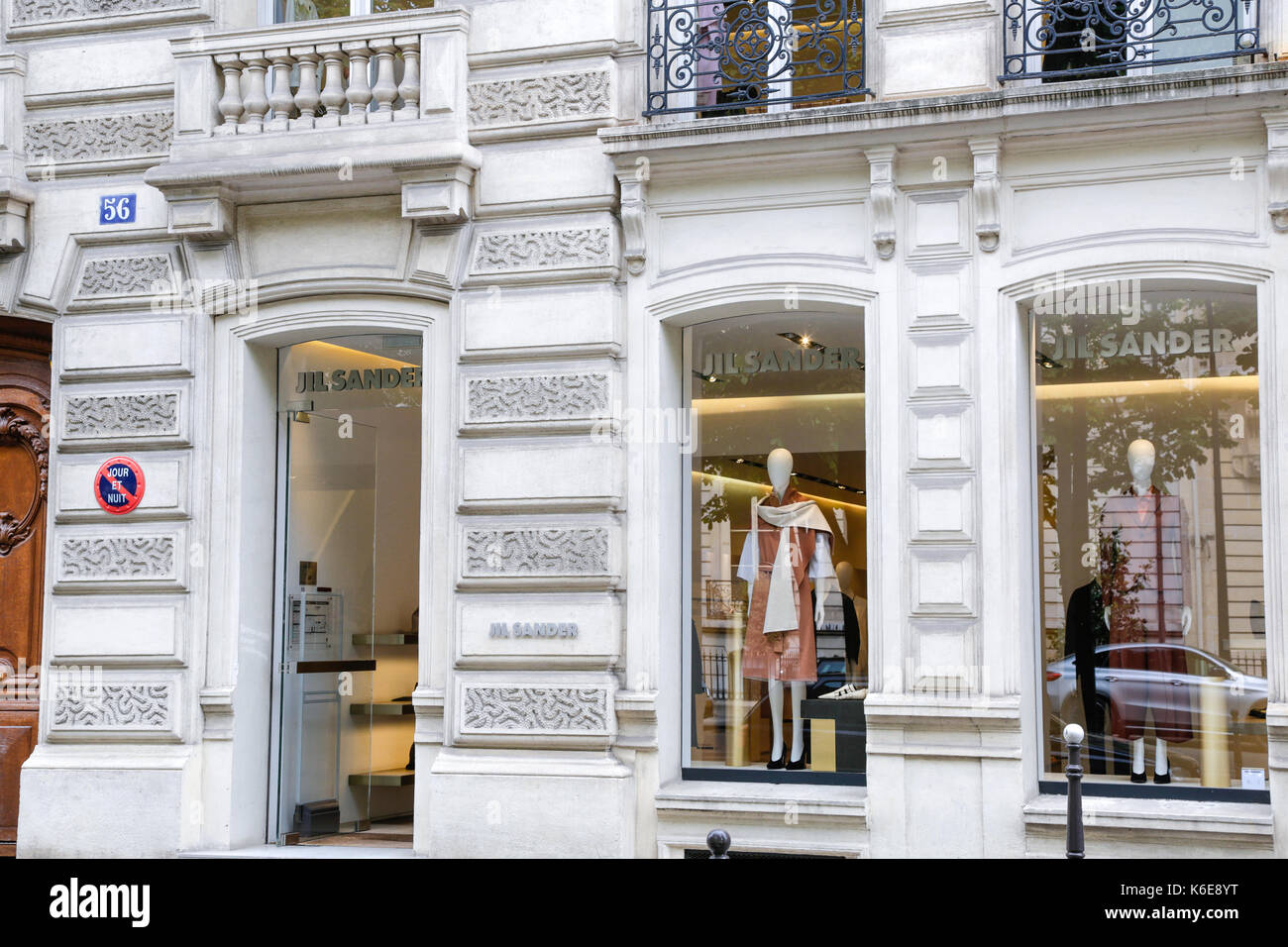 Paris, France: luxury branded shops in typical haussmann palaces and ...