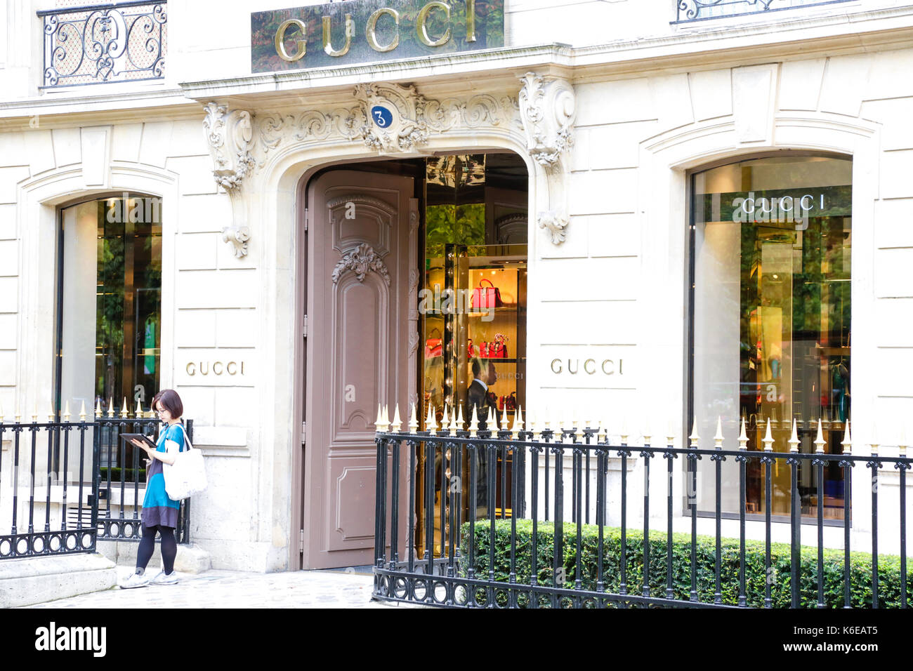 Paris, France: luxury branded shops in typical haussmann palaces and ...