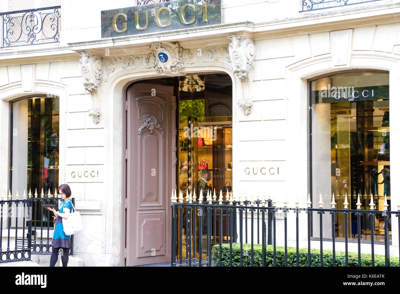 Paris, France: luxury branded shops in typical haussmann palaces and ...