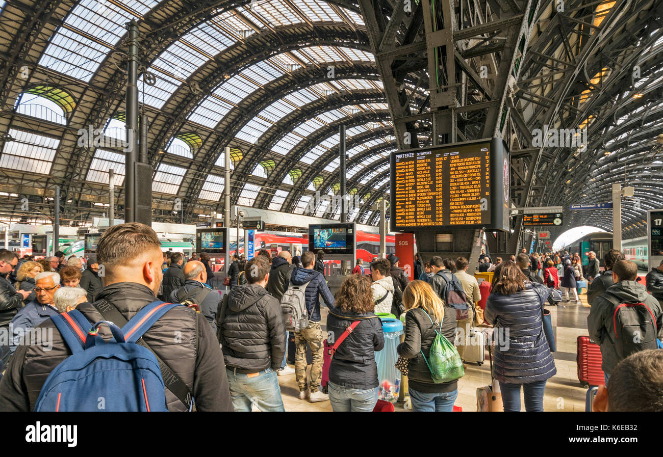 ITALY HIGH SPEED TRAINS AND MANY PASSENGERS BOARDING AT MILAN RAILWAY ...