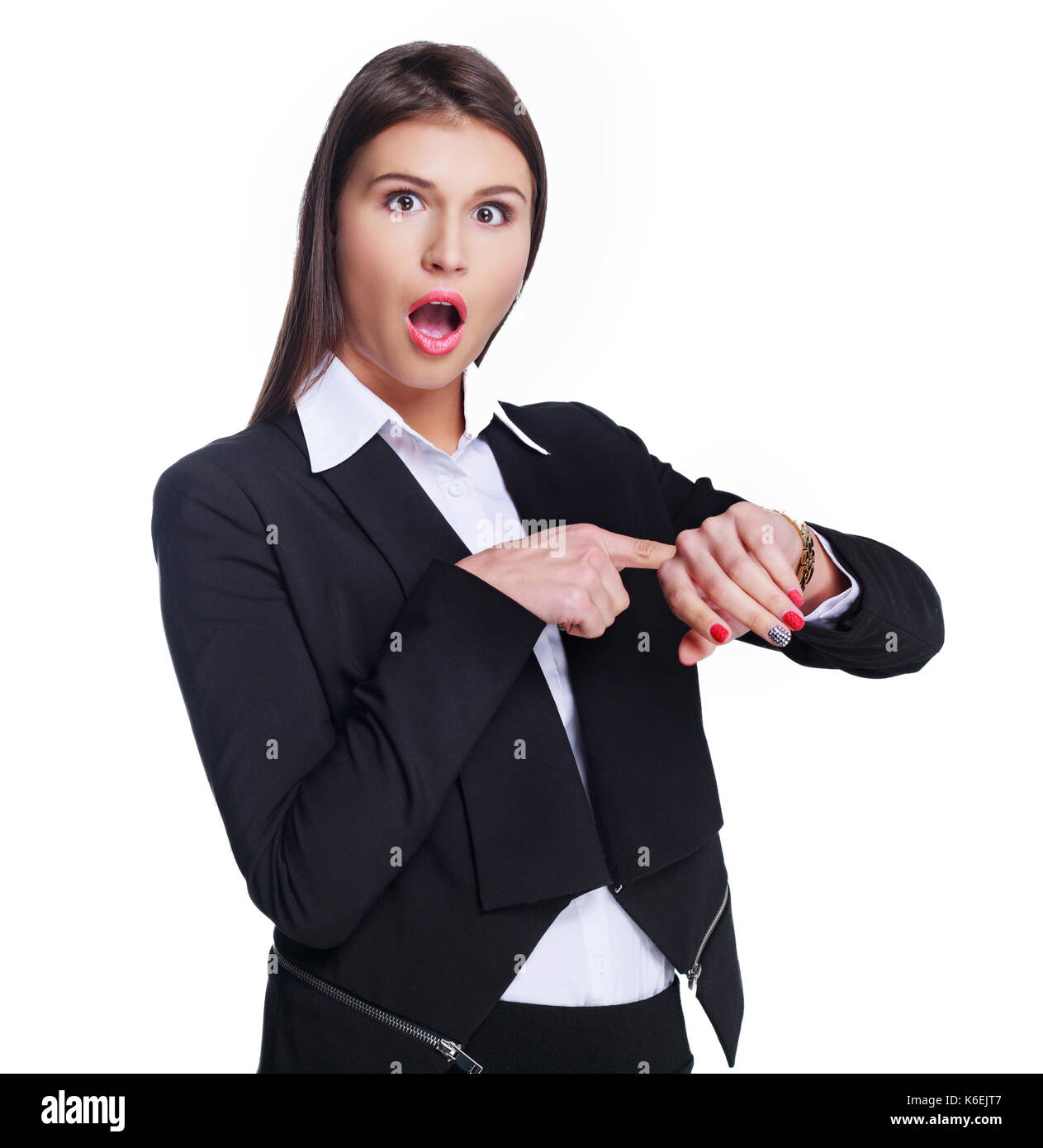 beautiful young businesswoman looking at her watch against white ...
