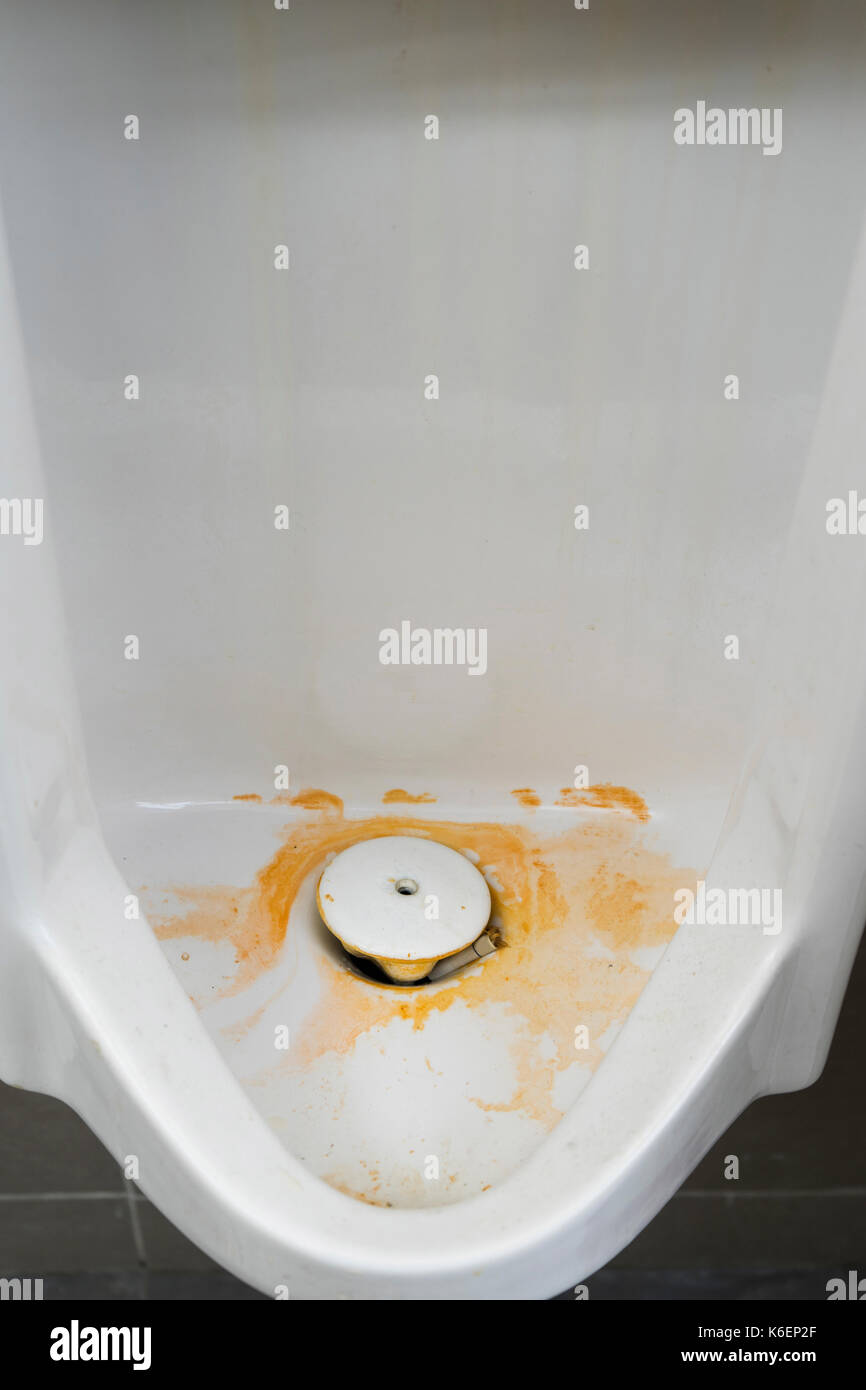 Closeup of dirty urinal in men's bathroom Stock Photo - Alamy
