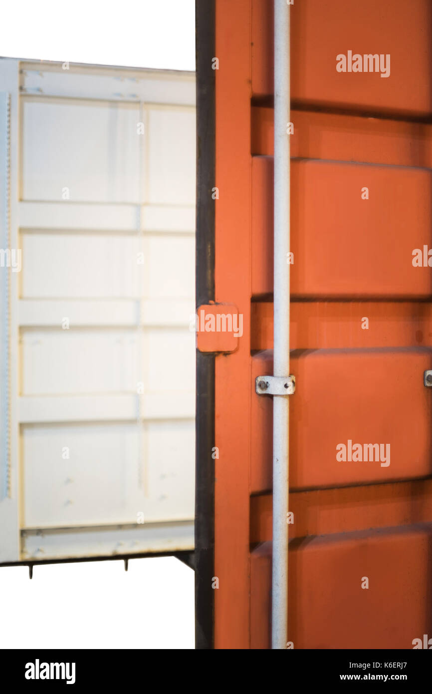 Side of orange shipping container door is opening Stock Photo - Alamy