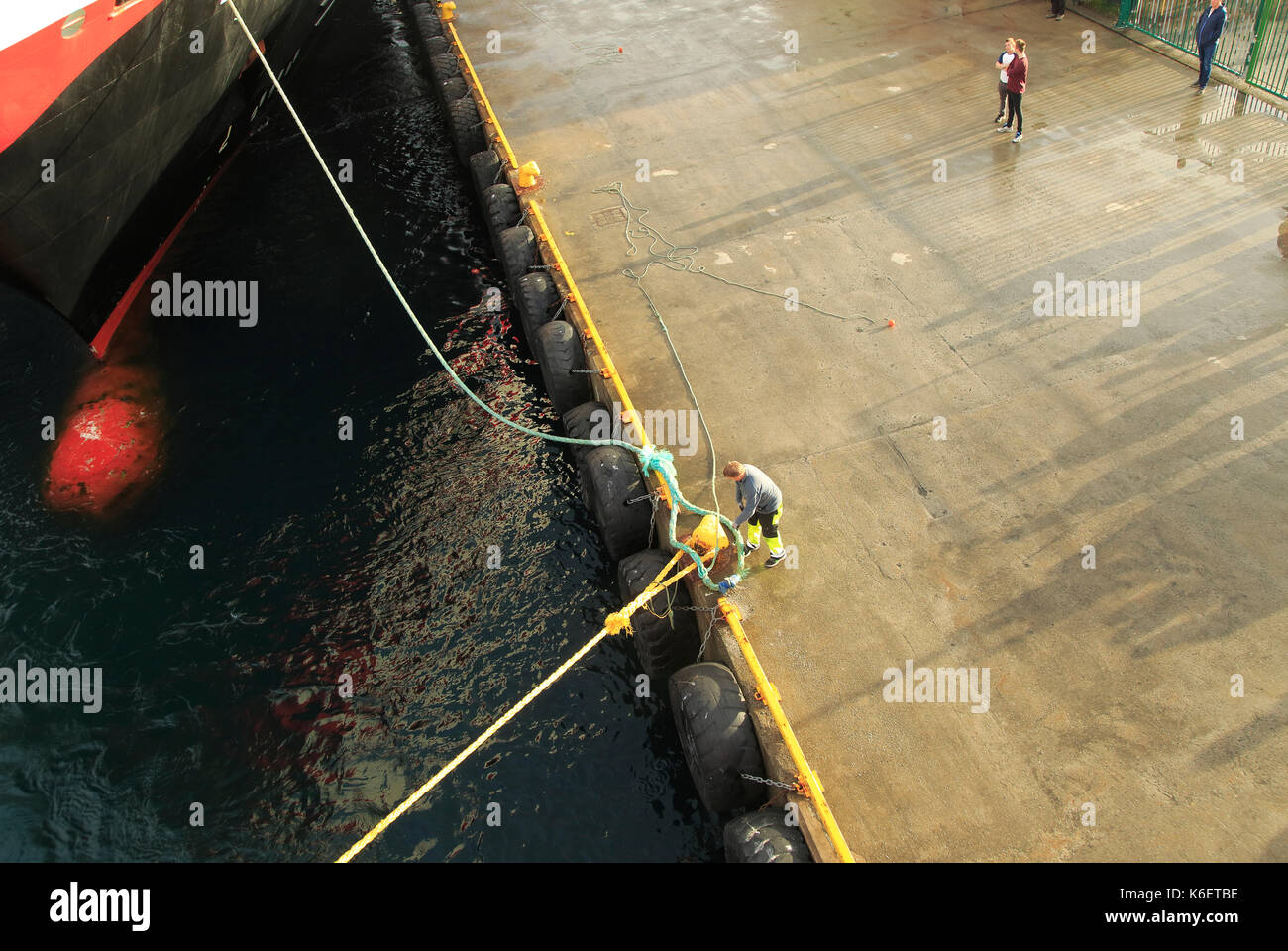 Hurtigruten ferry ship arriving at quayside of port quayside of Rorvik ...