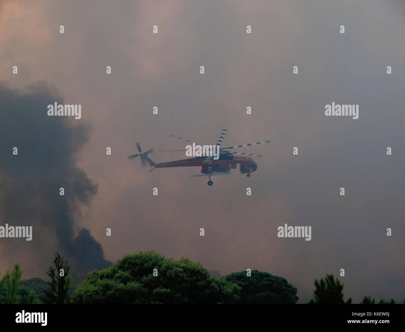 A fire fighting helicopter at work in Zakynthos, Greece Stock Photo - Alamy