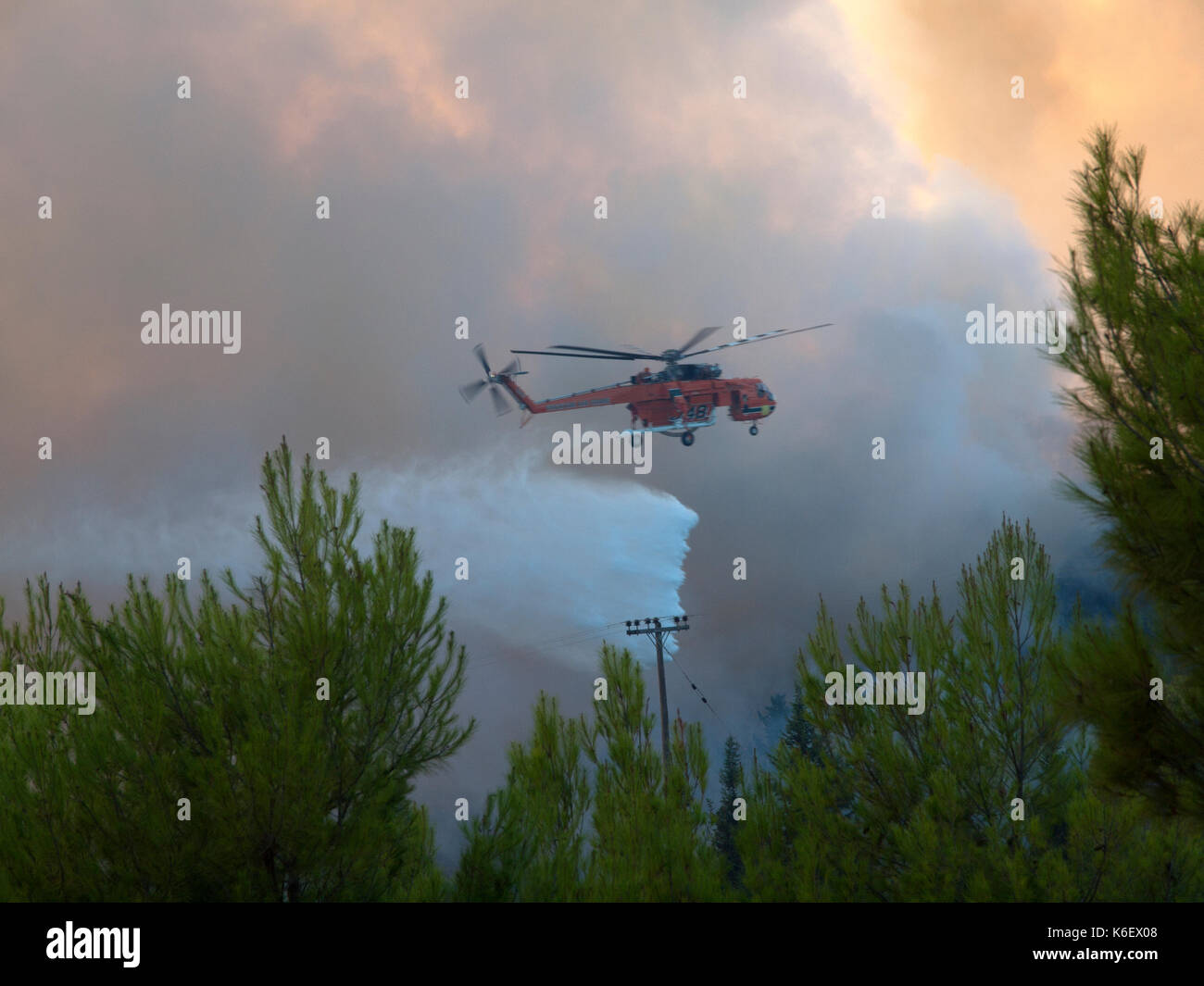 A fire fighting helicopter at work in Zakynthos, Greece Stock Photo - Alamy
