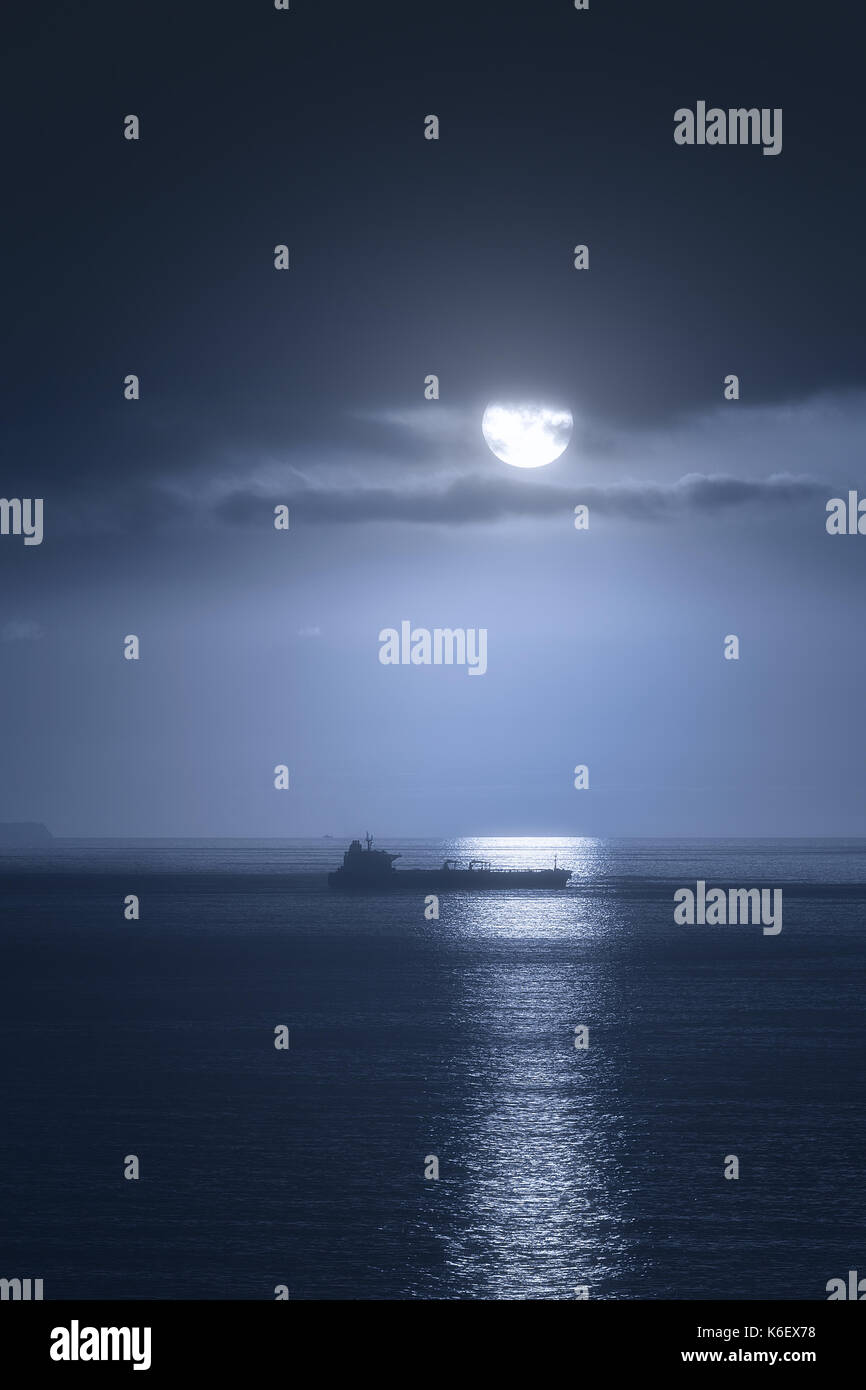 ship at night with moonlight Stock Photo - Alamy