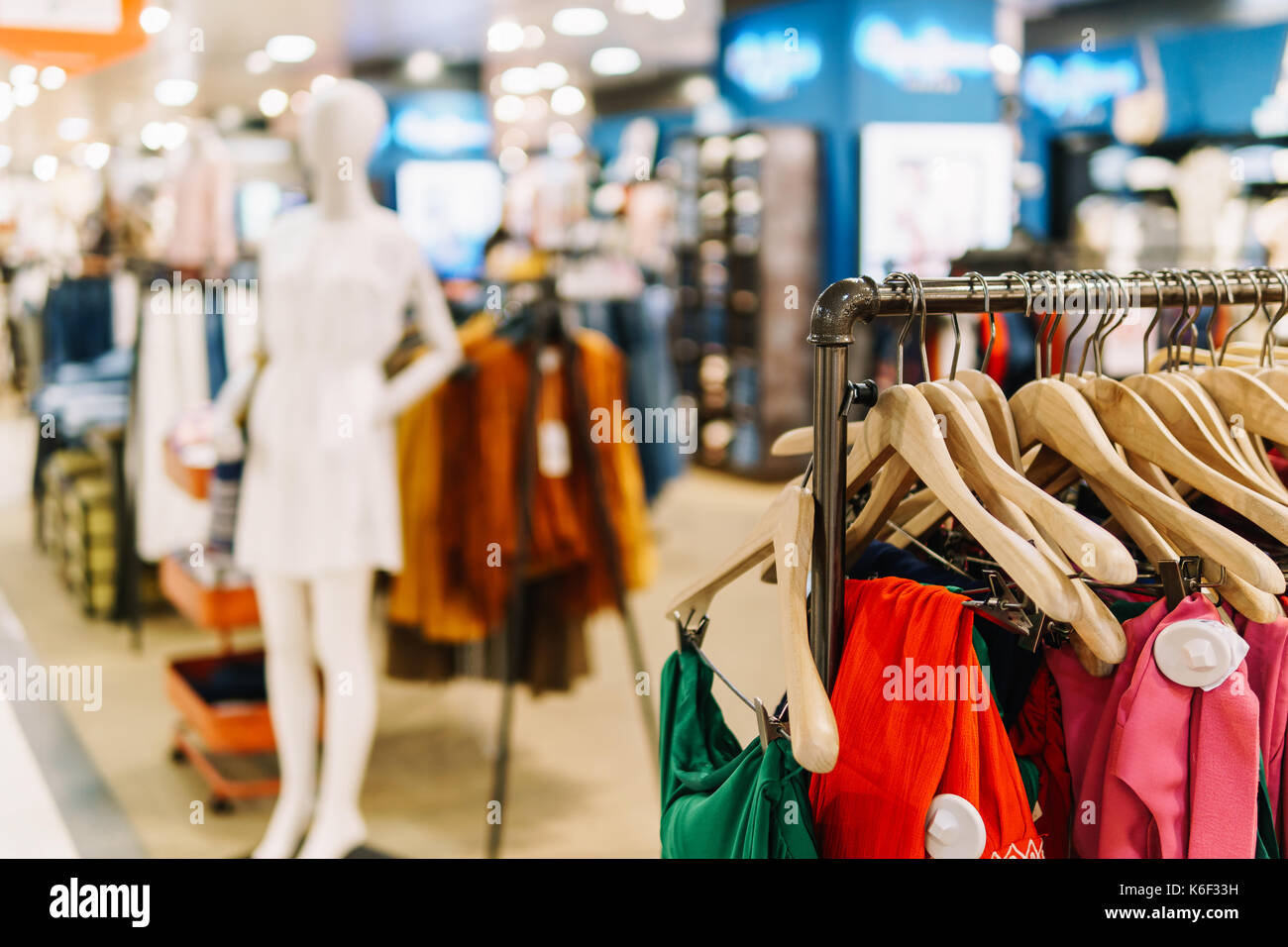 Woman Clothes Hanged On Fashion Store Hanger Stock Photo - Alamy