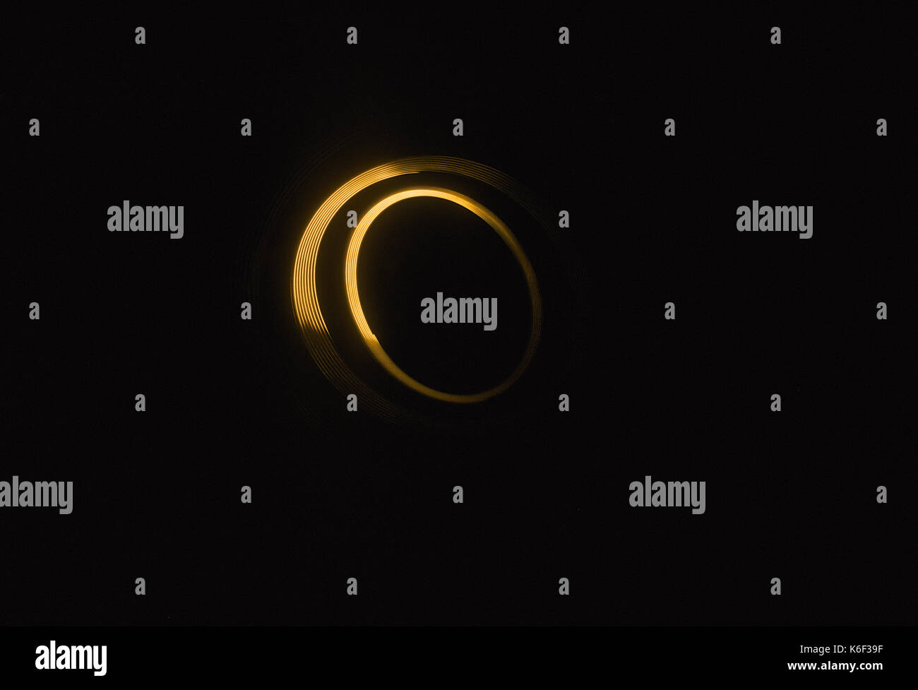 Circular Light trails against a black background Stock Photo - Alamy