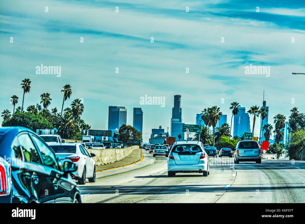 Traffic in Hollywood freeway with downtown L.A. in the background ...