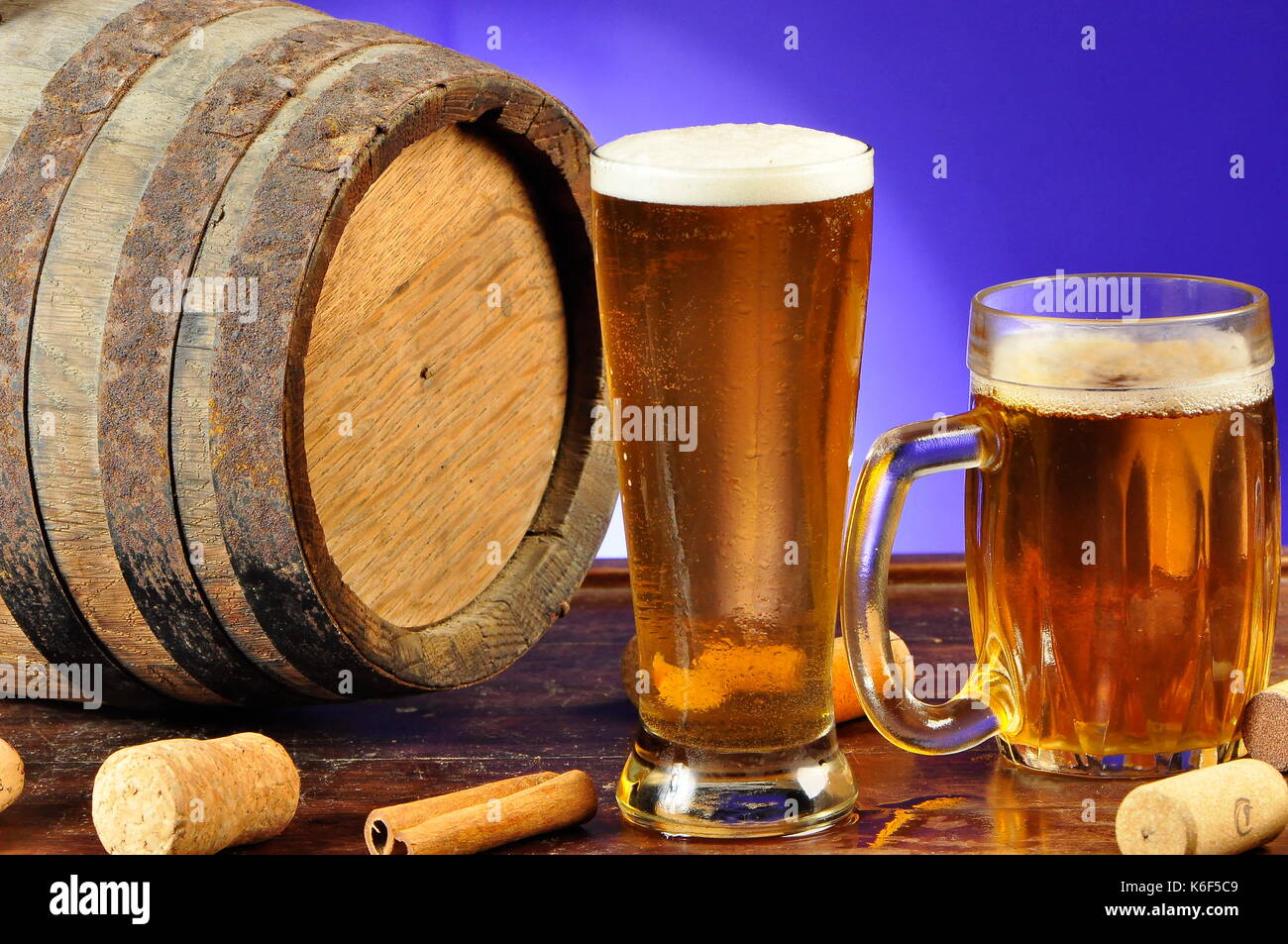Beer concept with blue background Stock Photo - Alamy