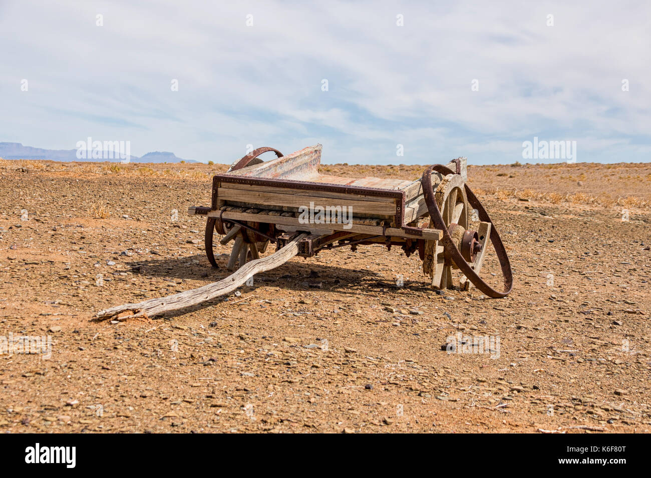 An old abandoned farm cart sitting in the desert in Southern Africa ...