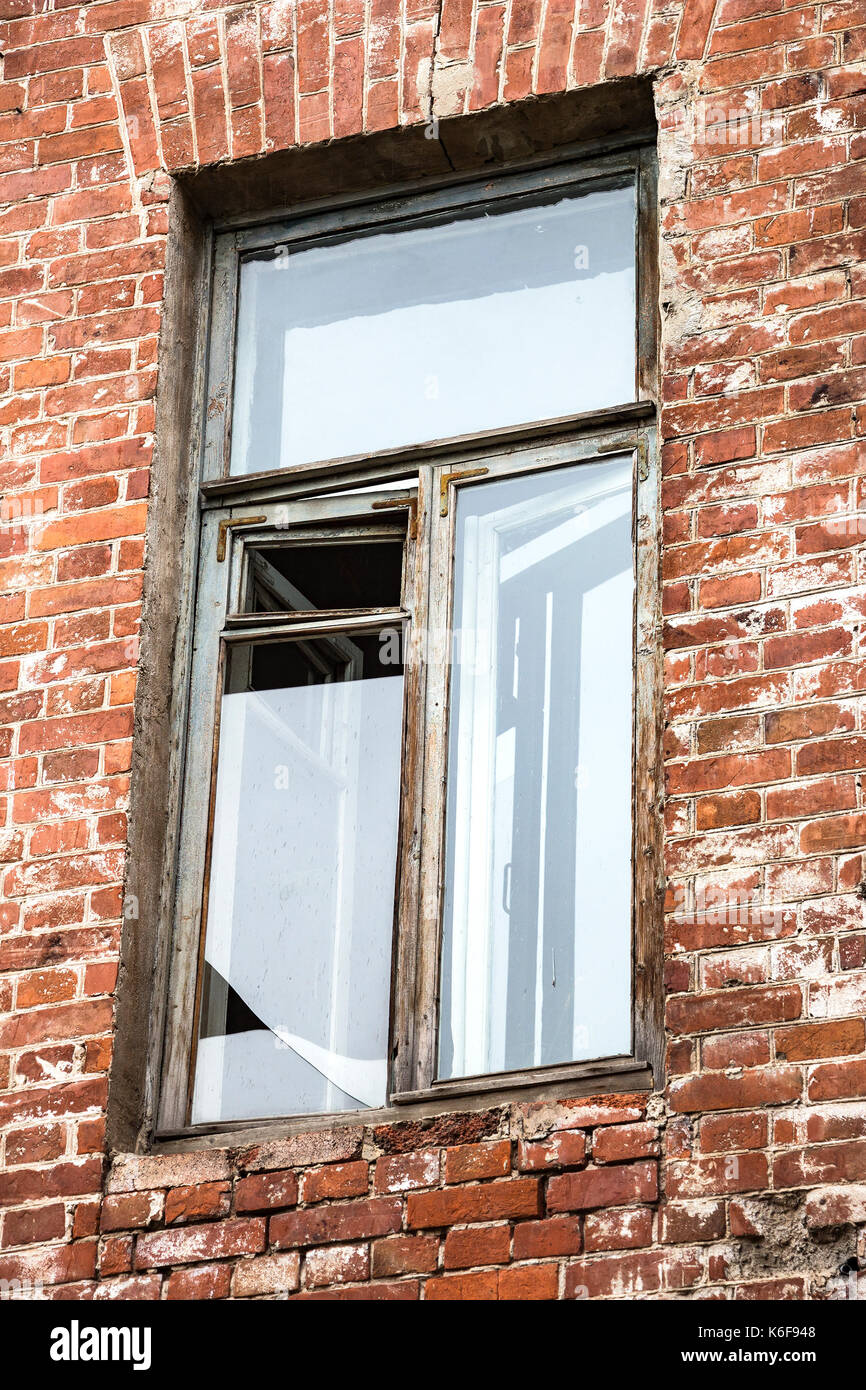 Broken window in an old house Stock Photo - Alamy