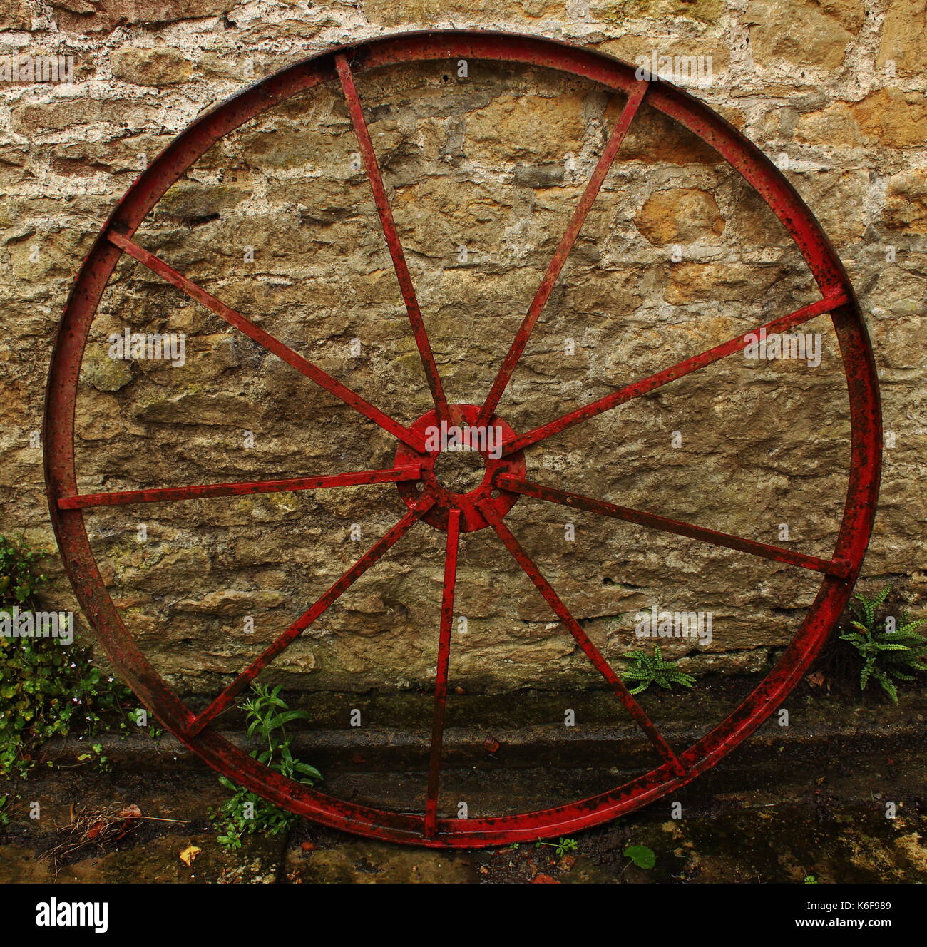 Red Metal Wheel Stock Photo - Alamy