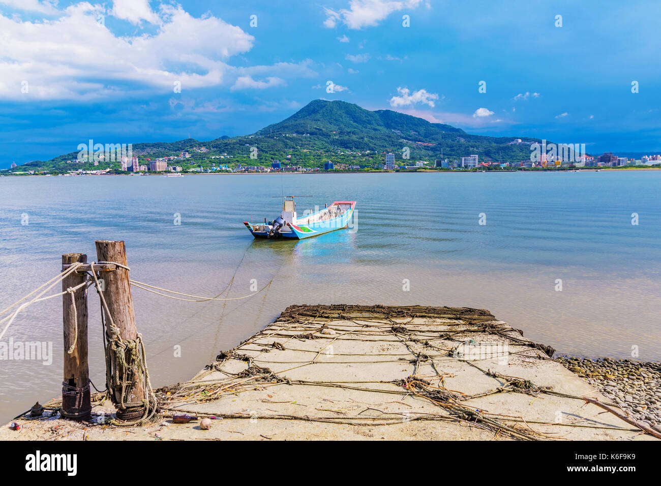 View of Tamsui sea and traditional fishing boat in Taiwan Stock Photo ...