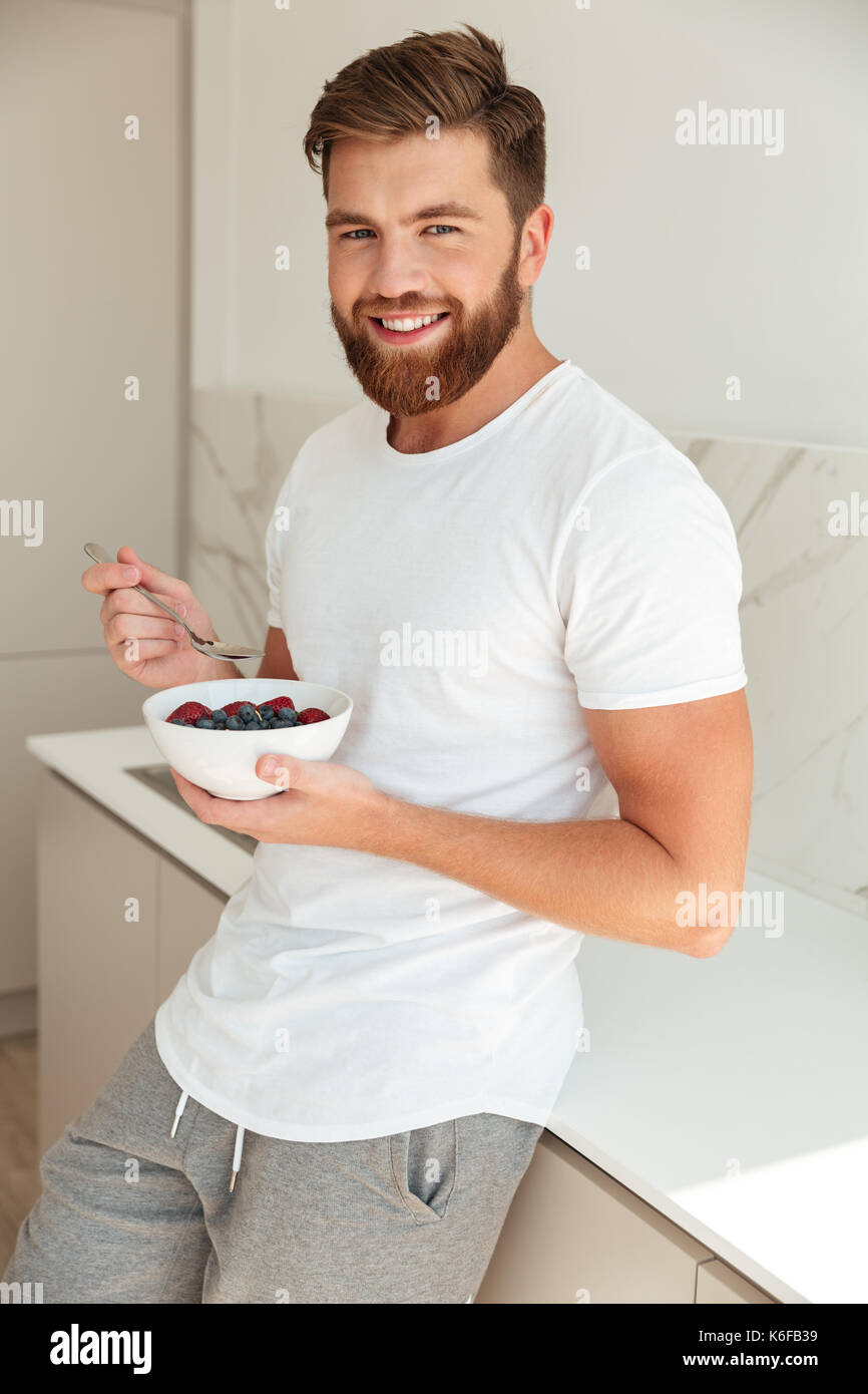 Man eating fruit hi-res stock photography and images - Alamy